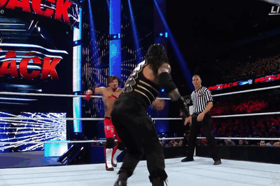 Wwe Roman Reigns Superman Punch Gif