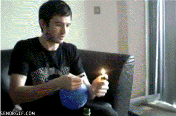 Dude lights balloon on fire, seems surprised when it gets ou - Gif Abyss