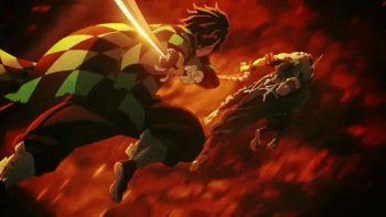 Tanjiro Kamado in Fiery Duel – Demon Slayer Anime Action GIF