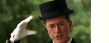 Download TV Show The Colbert Report Performer Hat Formal Attire Gif